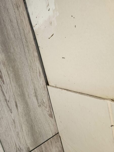 Best way to handle vinyl close to tiled wall. - RedFlagDeals.com Forums